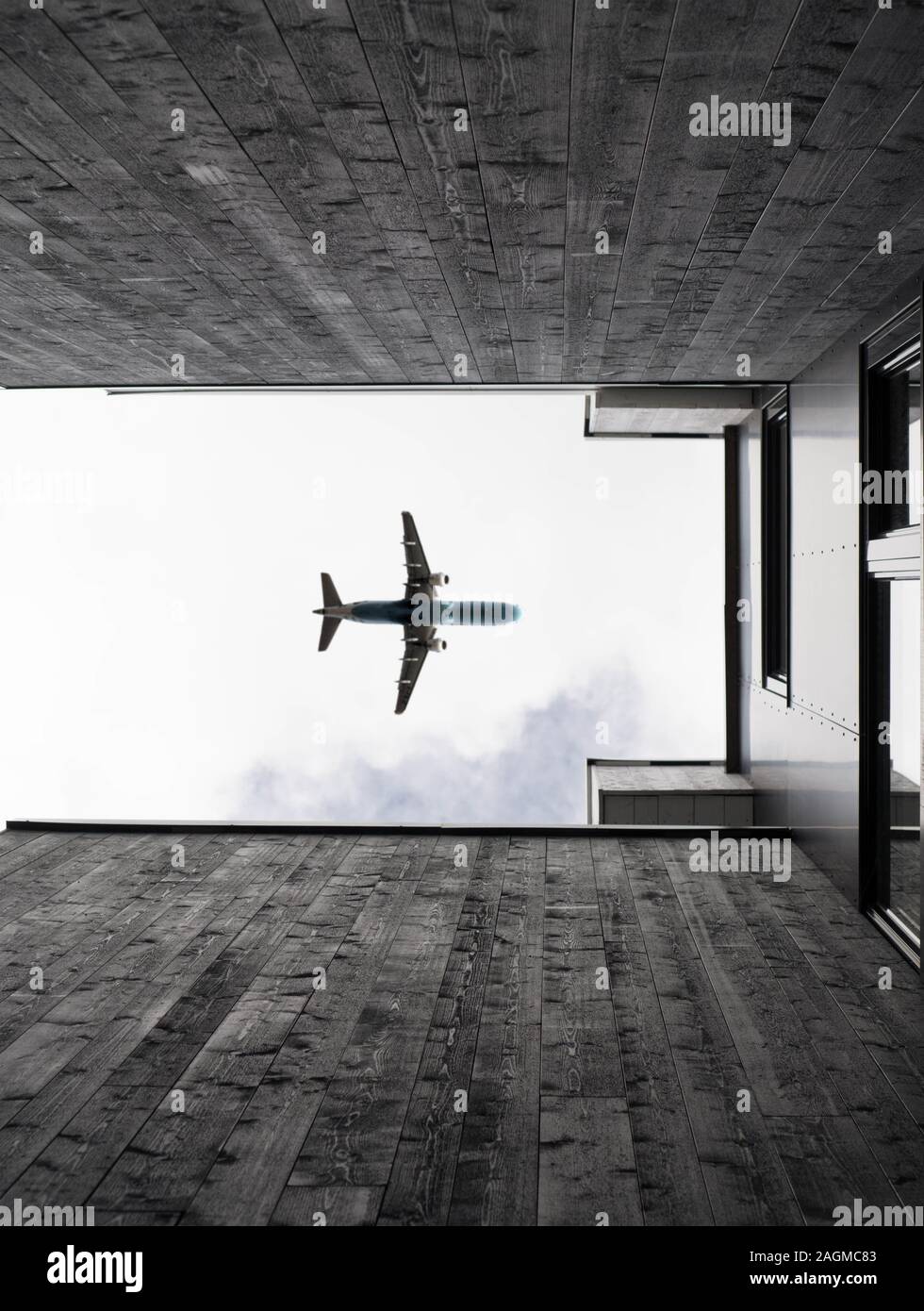 Vertical low angle shot of an airplane flying in the clear sky Stock ...