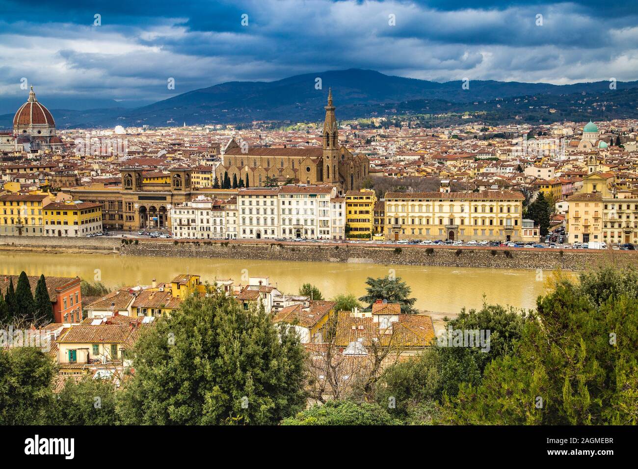 FLORENCE, ITALY - DECEMBER 15, 2019: river running through the ...
