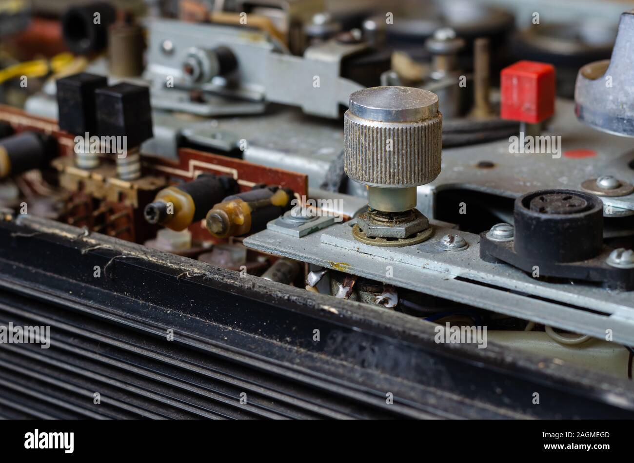 Close-up of volume control of used bobbin tape recorder. Old ...