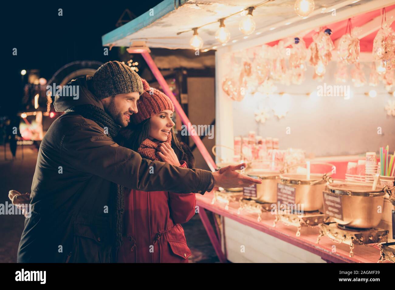 Nice attractive charming lovely cheerful couple wearing warm outfit ...