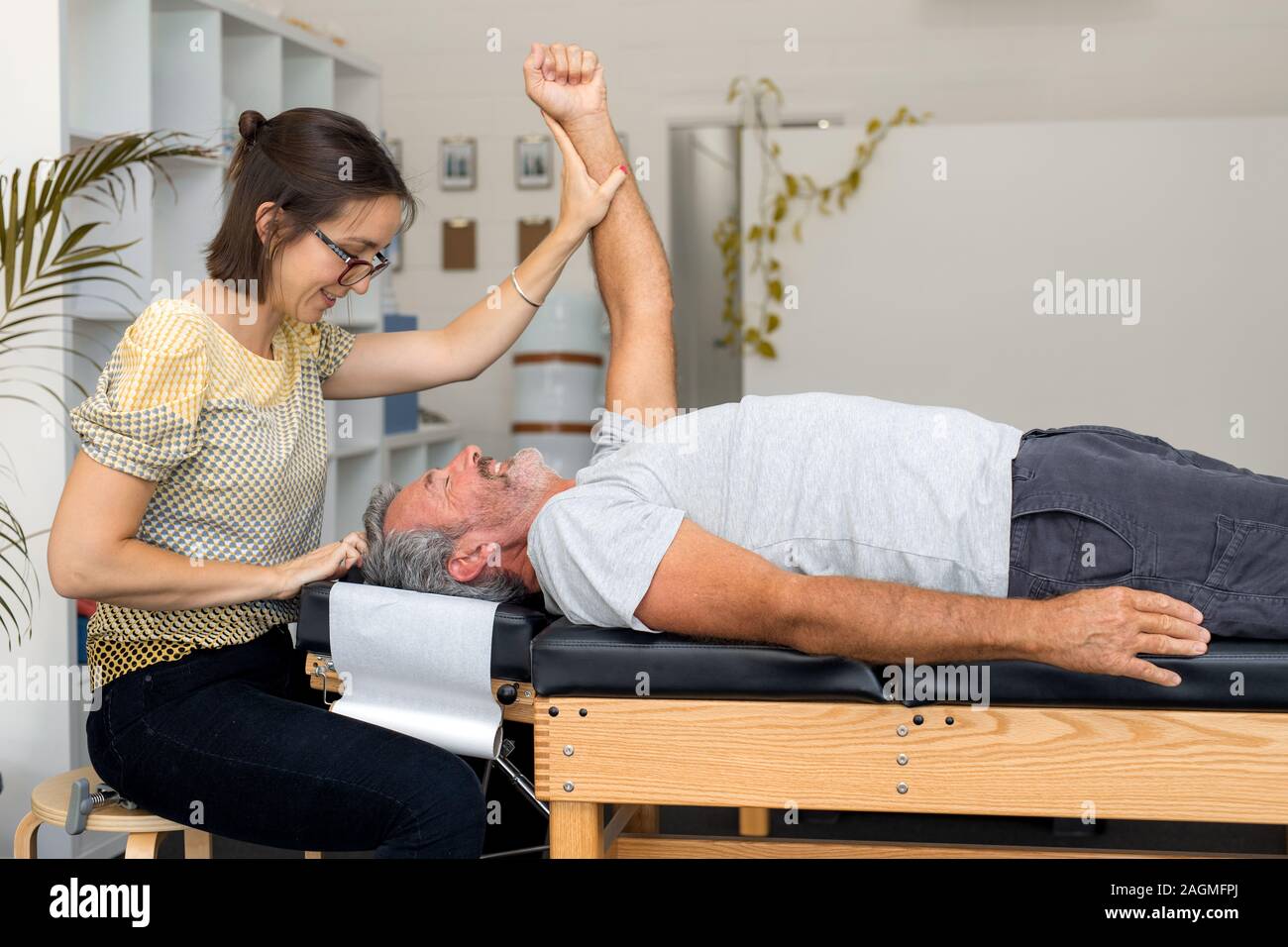 Chiropractic neck manipulation hi-res stock photography and images - Alamy