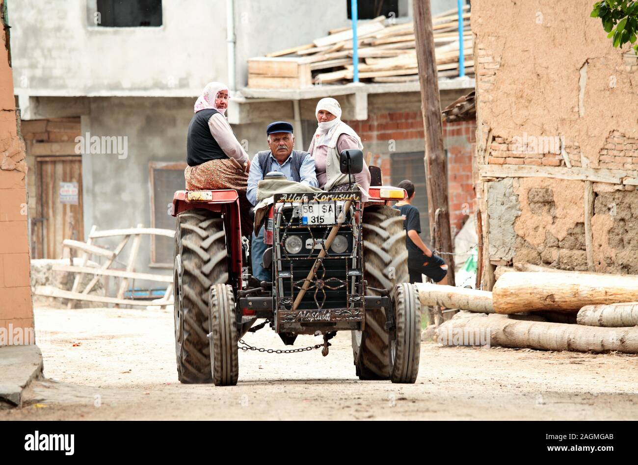 Farmer riding tractor hi-res stock photography and images - Alamy