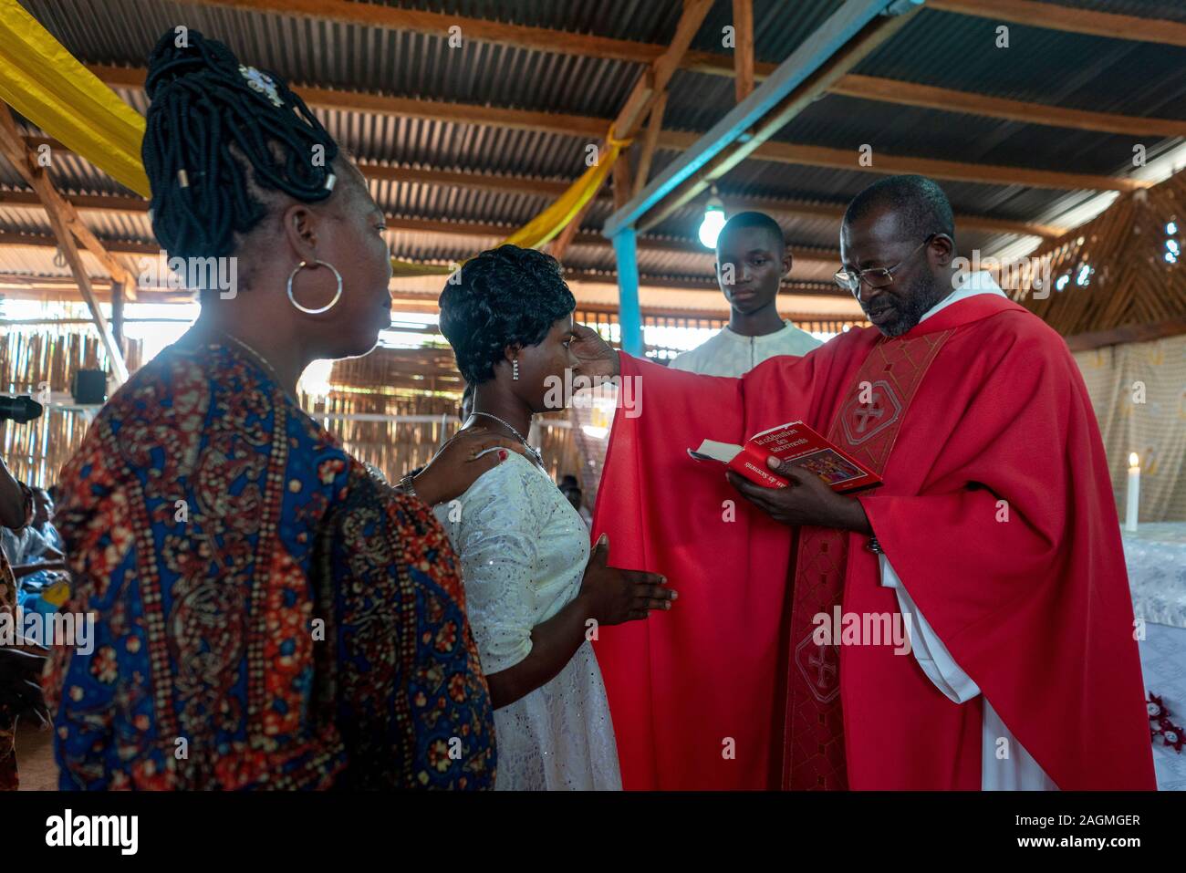 Blessing by the priest Stock Photo - Alamy