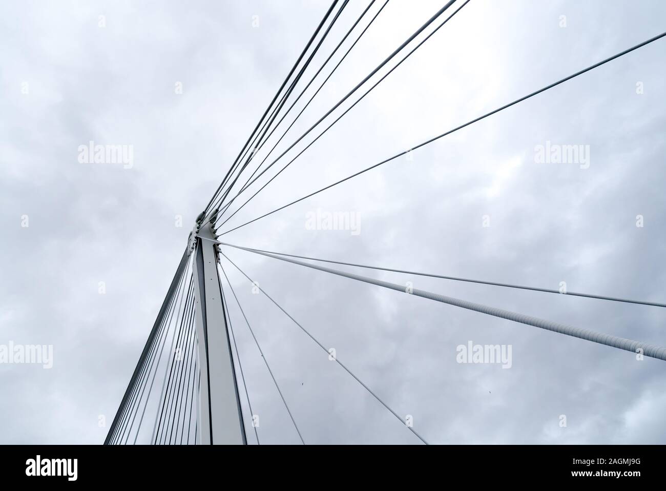 close up detail of modern steel cable-stayed suspension bridge under an ...