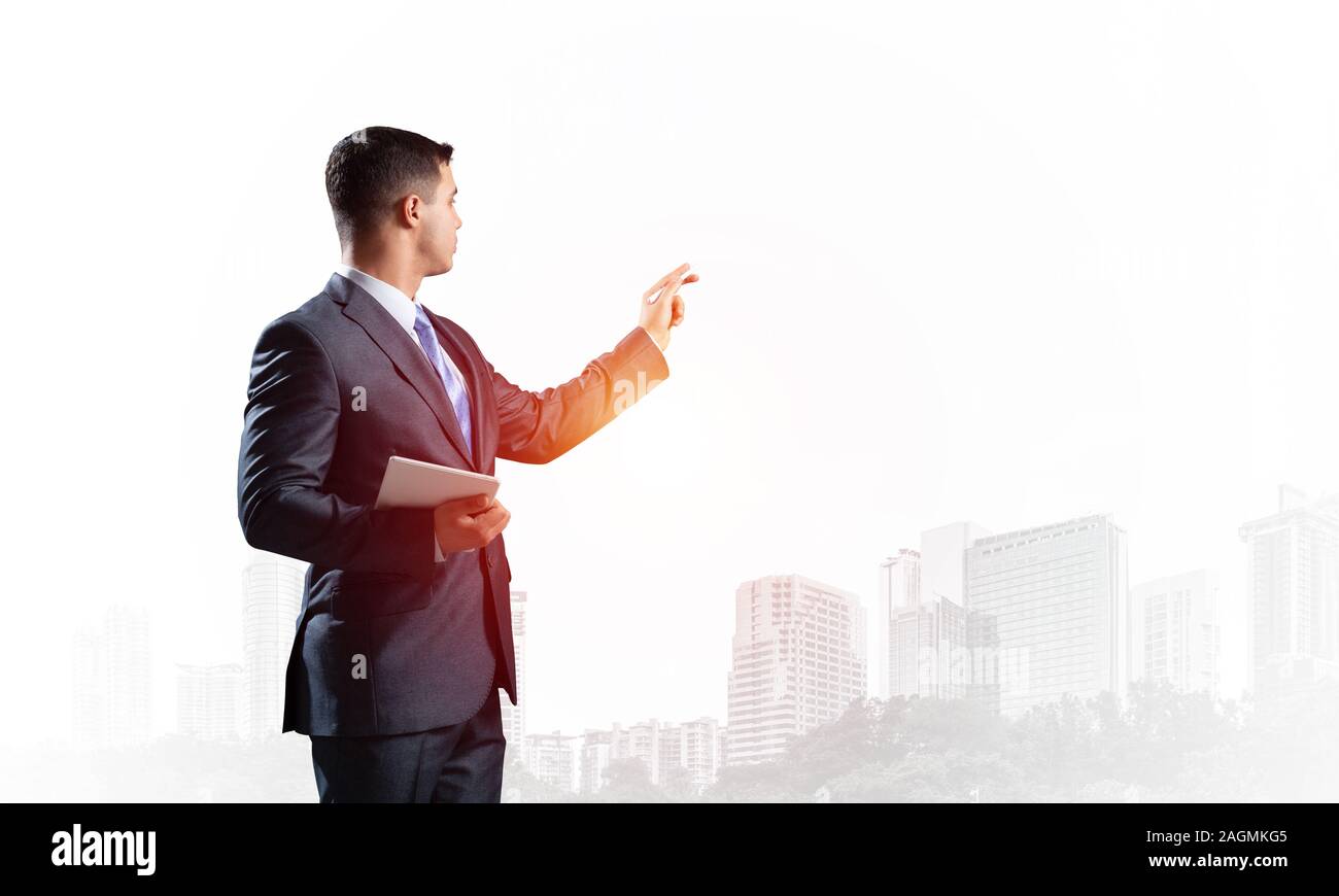 Side view of manager in business suit and tie Stock Photo - Alamy