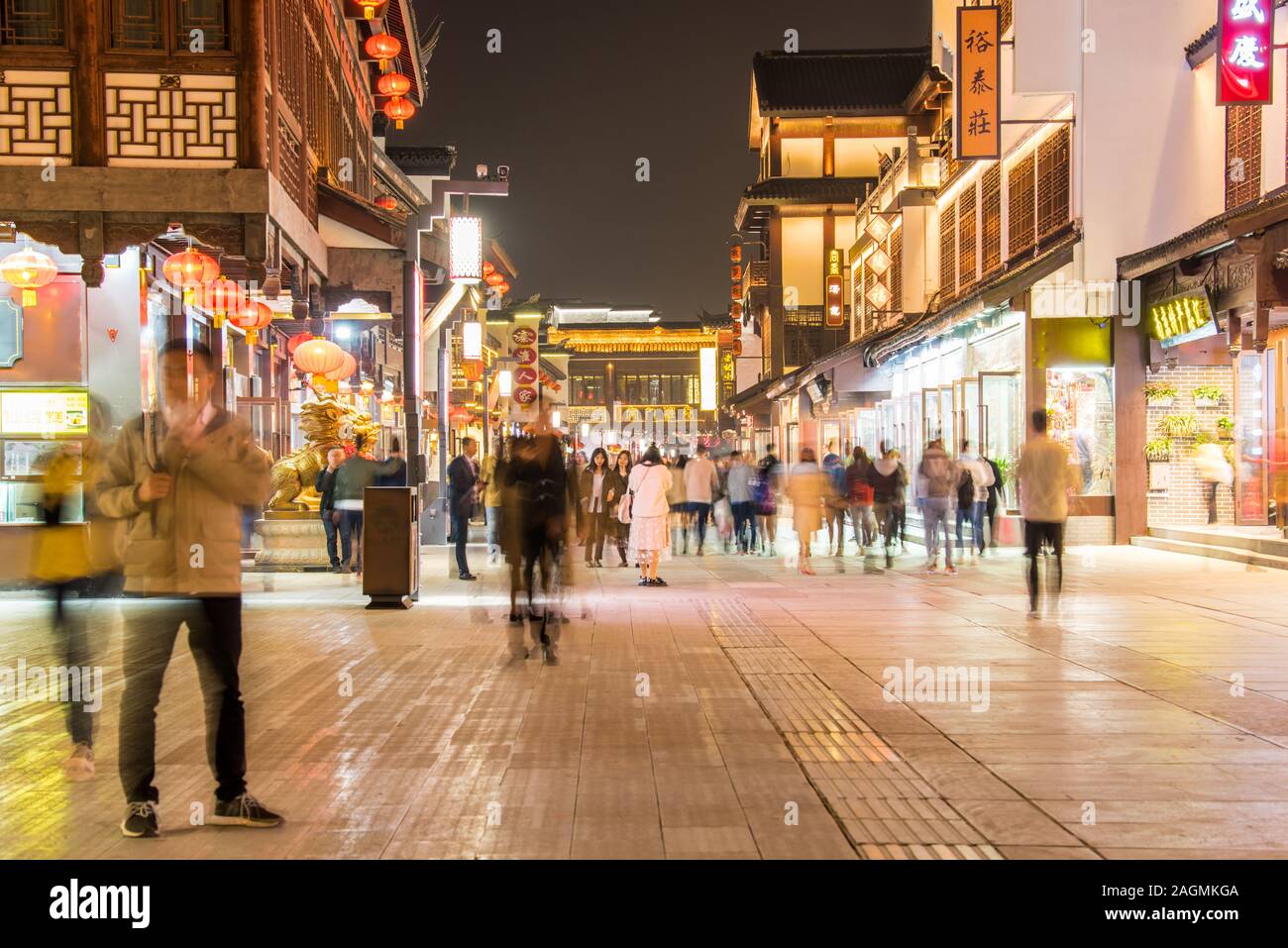 Night view of historic buildings at the riverbank of Qinhuai River near ...