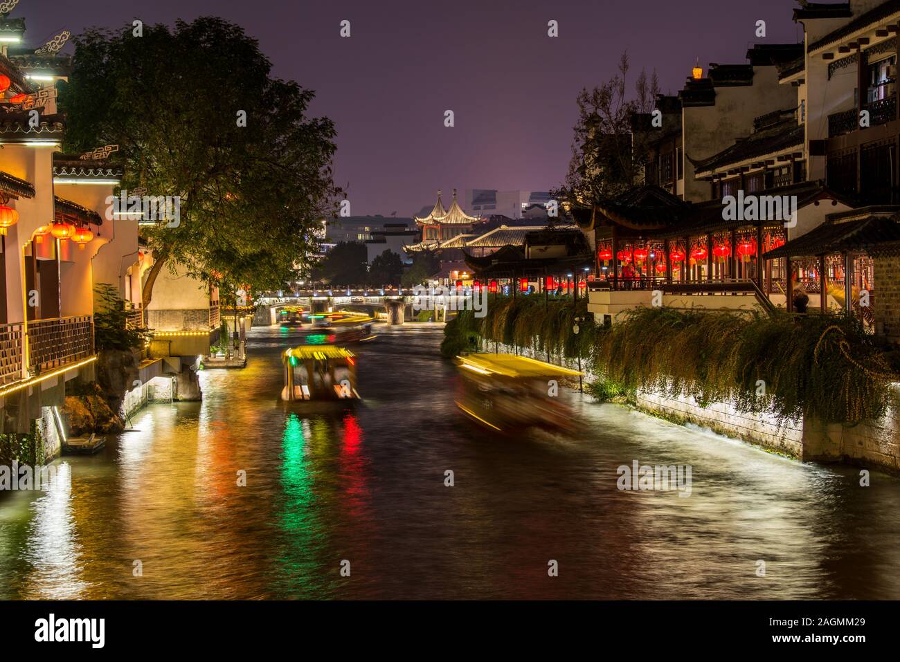 Night view of Qinhuai River and historic buildings at the riverbank ...