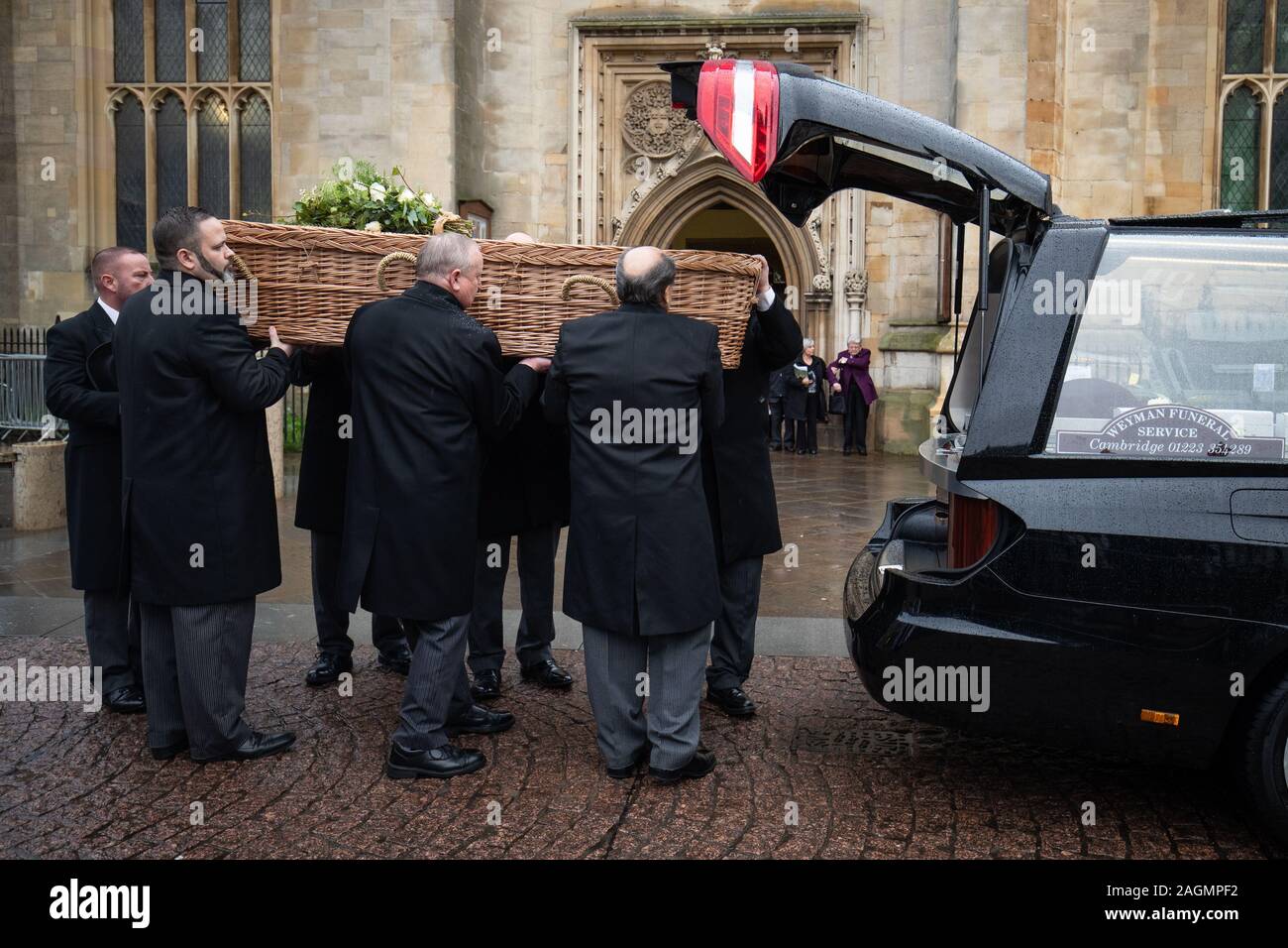 The coffin leaves Great St Mary's Church in Cambridge, following the ...