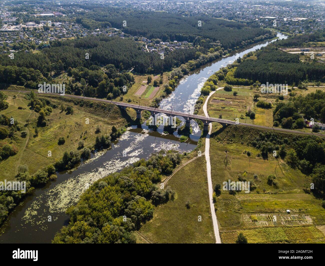 Aerila view to beautiful railway bridge viaduct over the river Sluch ...