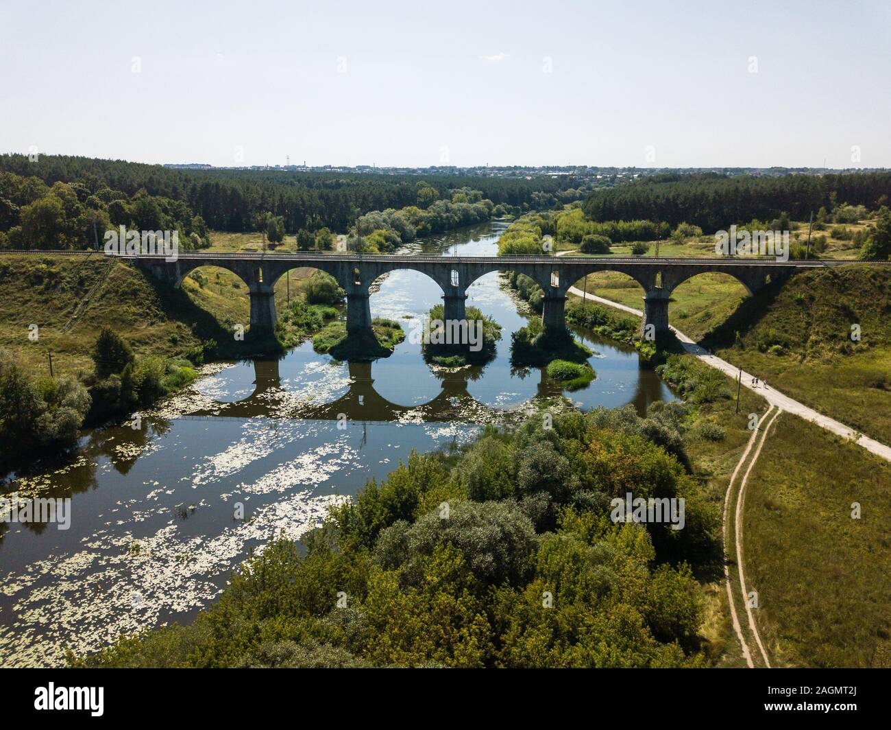 Aerila view to beautiful railway bridge viaduct over the river Sluch ...