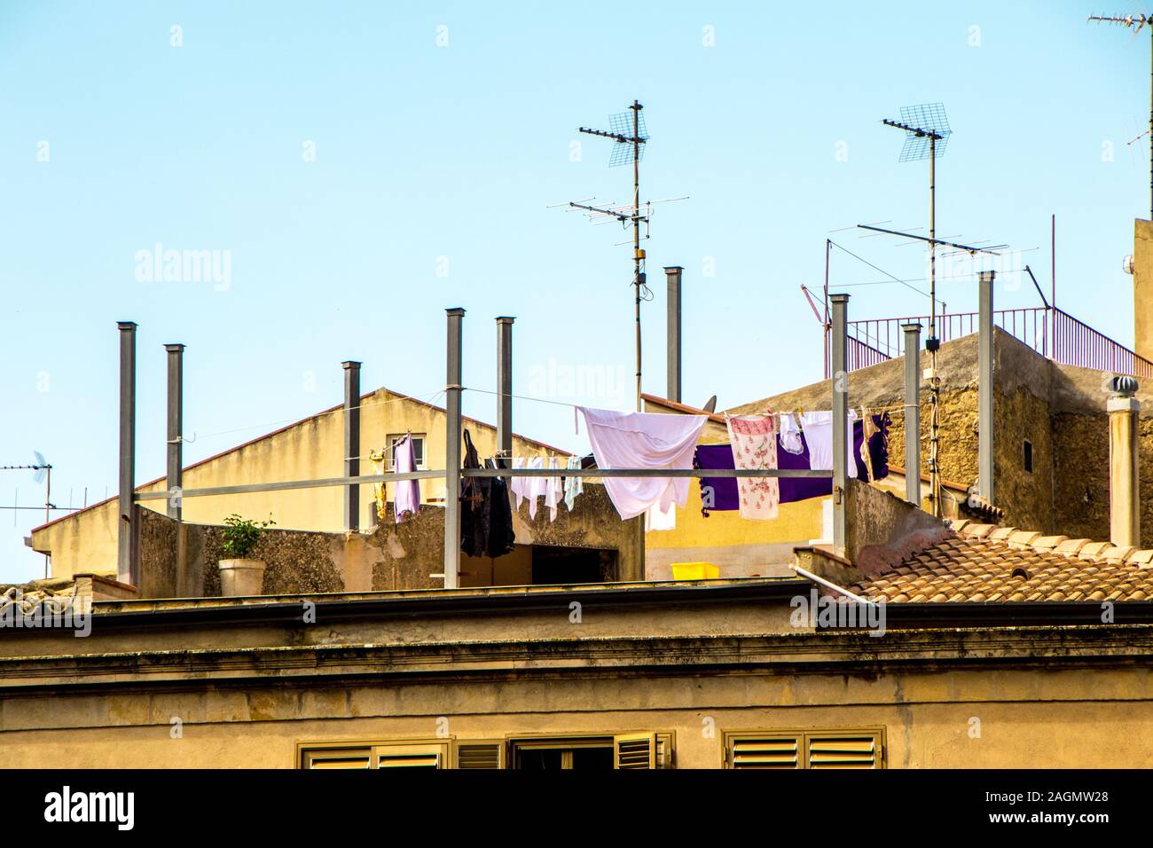 The traditional way of drying your washing in Italy Stock Photo - Alamy