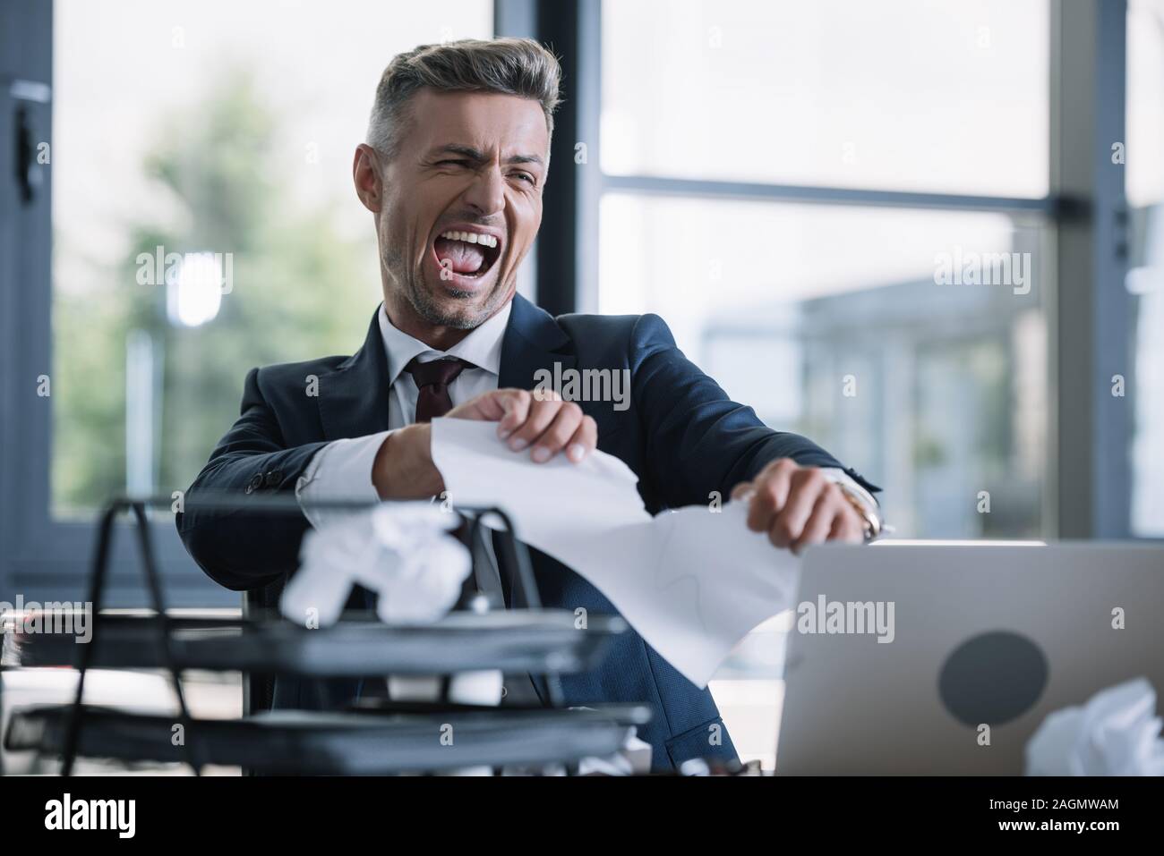 Tearing paper hi-res stock photography and images - Alamy