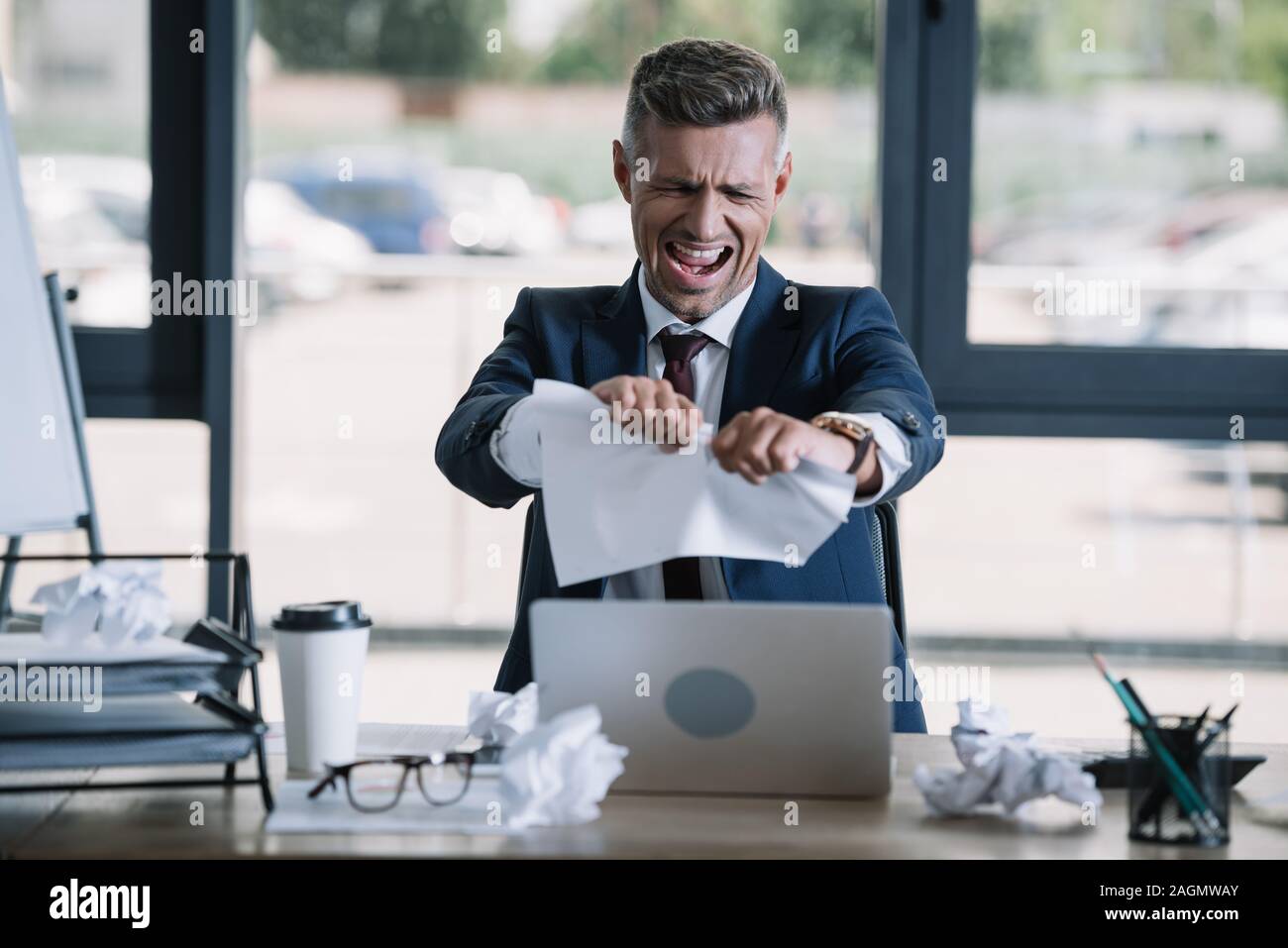 Tearing paper hi-res stock photography and images - Alamy