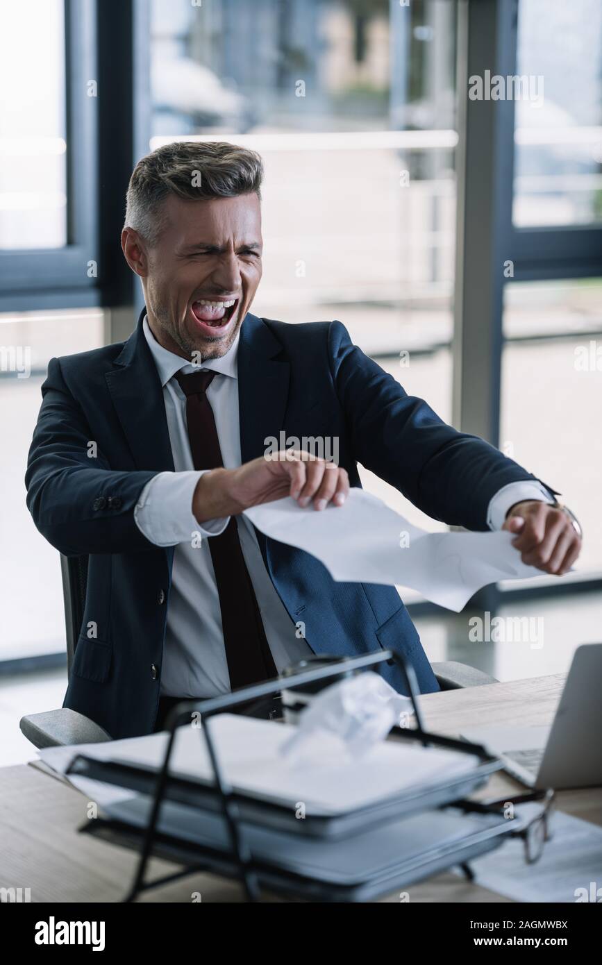 Tearing paper hi-res stock photography and images - Alamy
