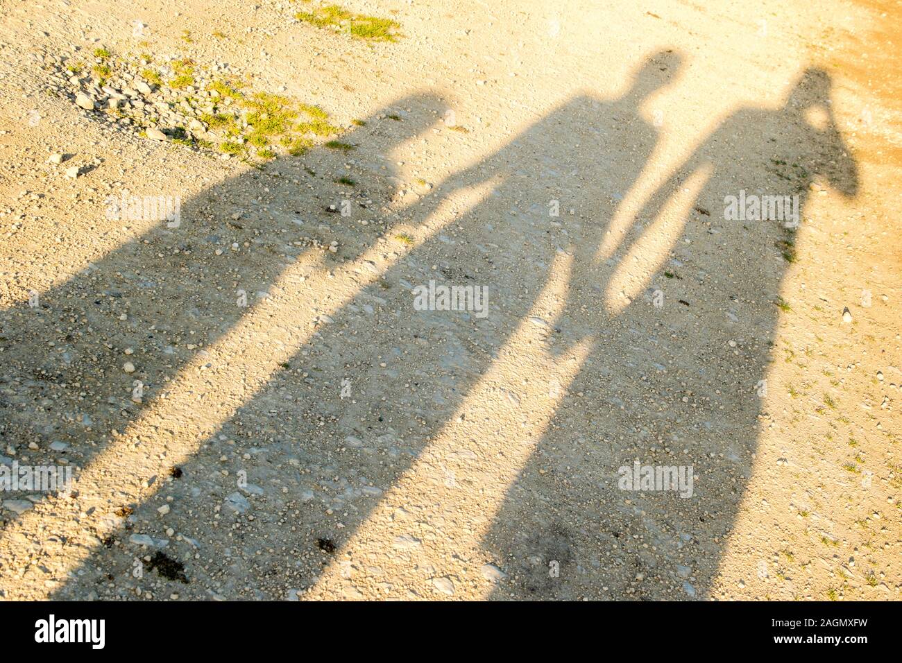 Long shadows of humans hi-res stock photography and images - Alamy
