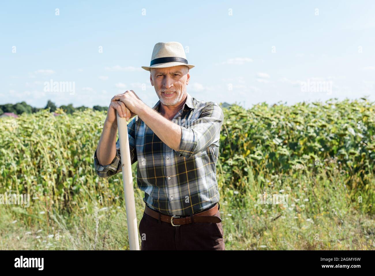 Happy farmer hi-res stock photography and images - Alamy