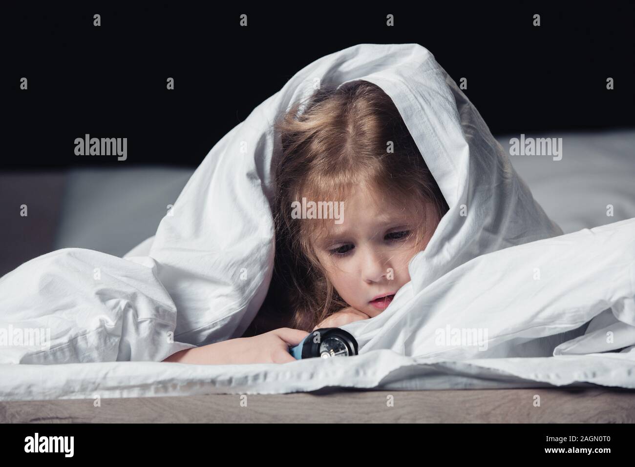 Child preteen flashlight bed hi-res stock photography and images - Alamy
