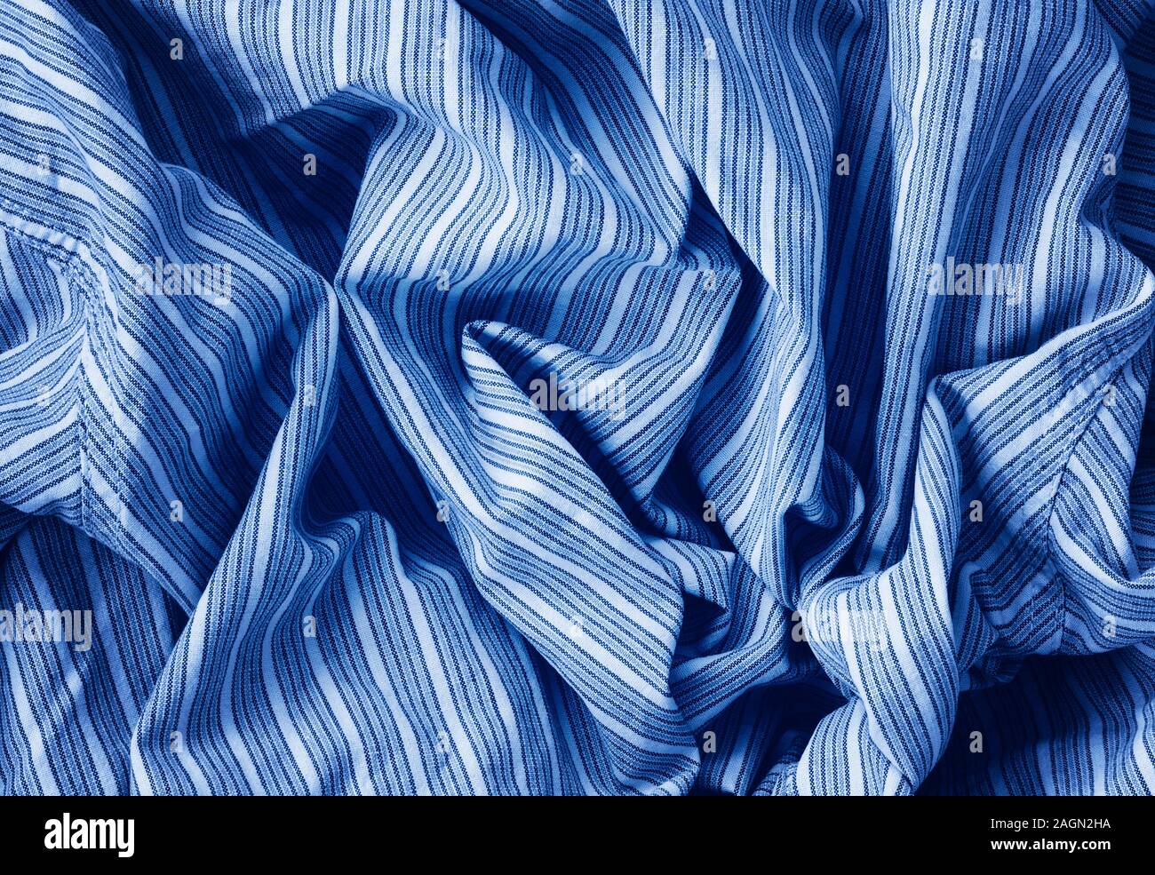 Closeup classic blue macro texture of blue linen cotton material fabric ...