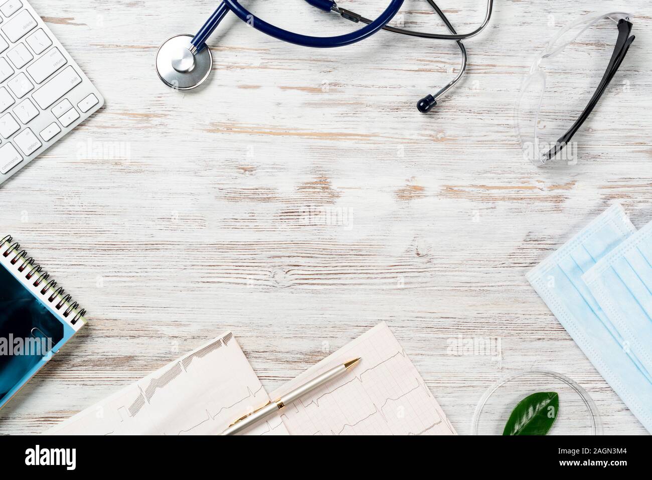 Doctors desktop with medical supplies Stock Photo - Alamy