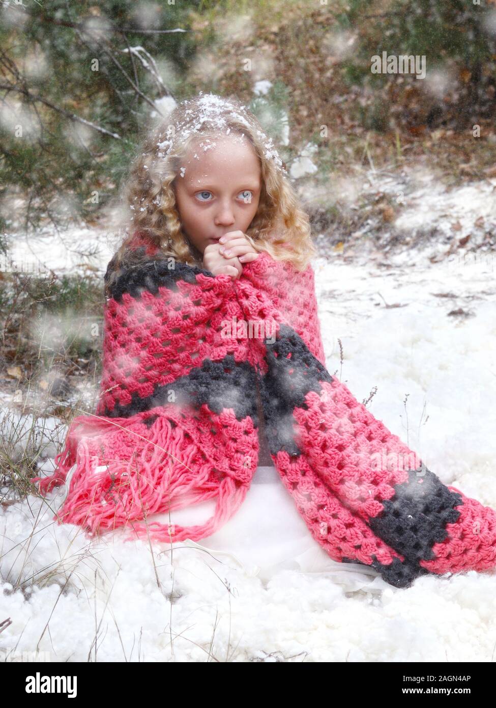 little girl frozen in the winter forest. girl in the winter forest ...