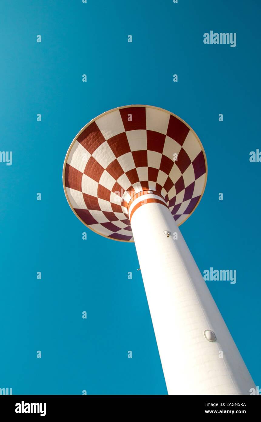 A VERY tall red and white water tower Stock Photo - Alamy