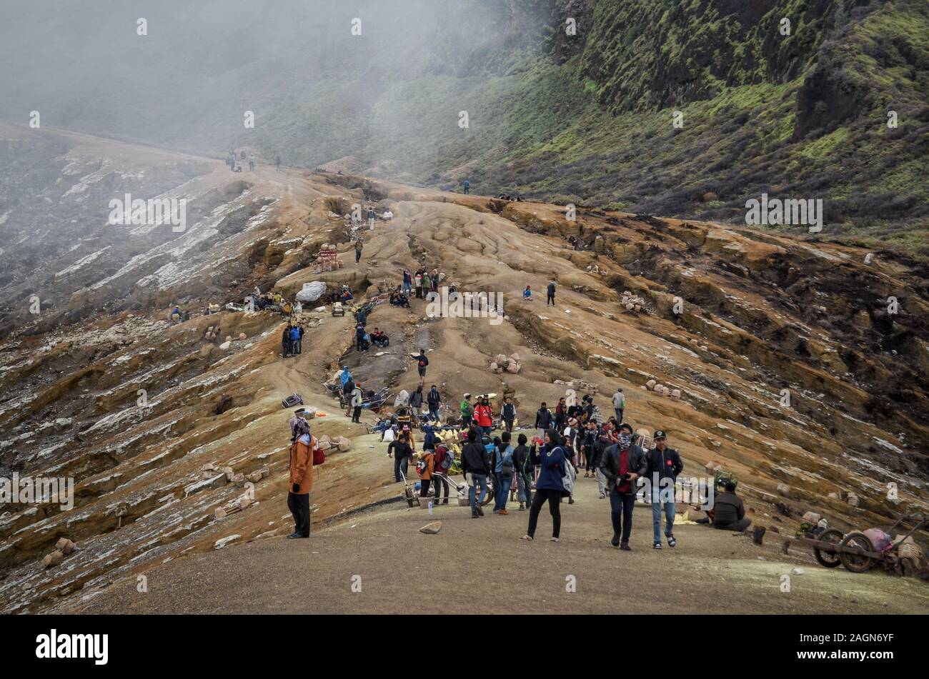 Tourists on the crater rim of Mount Ijen, Banyuwangi, East Java ...