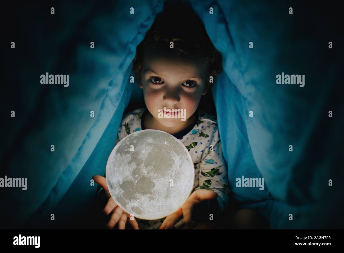 Toddler Boy with Moon Stock Photo - Alamy