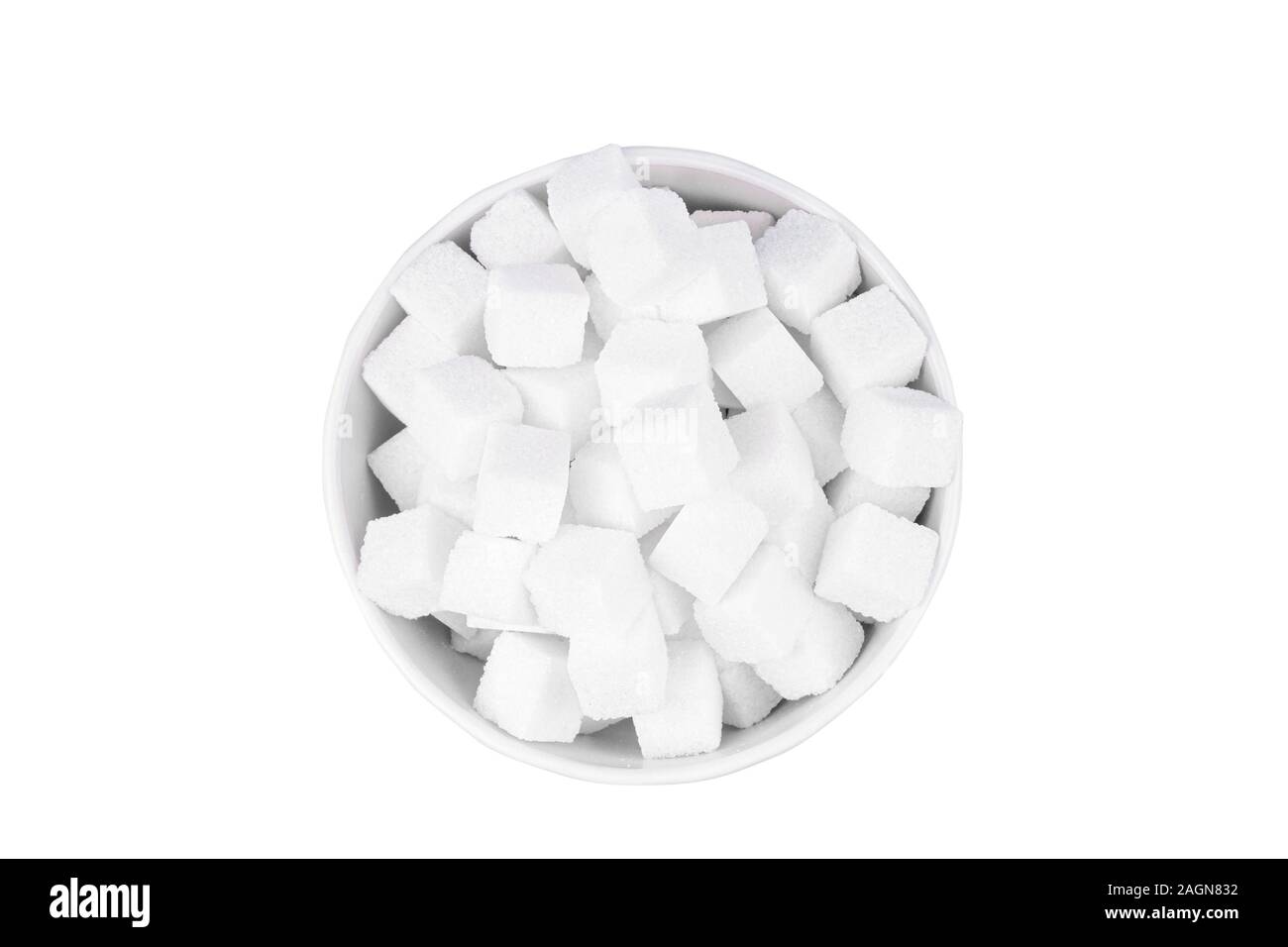 bowl of white sugar on a white background top view Stock Photo - Alamy
