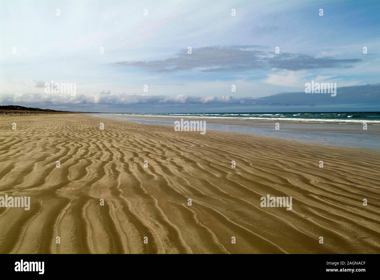Australia, sandy beach and the small rocks named The Granites in ...