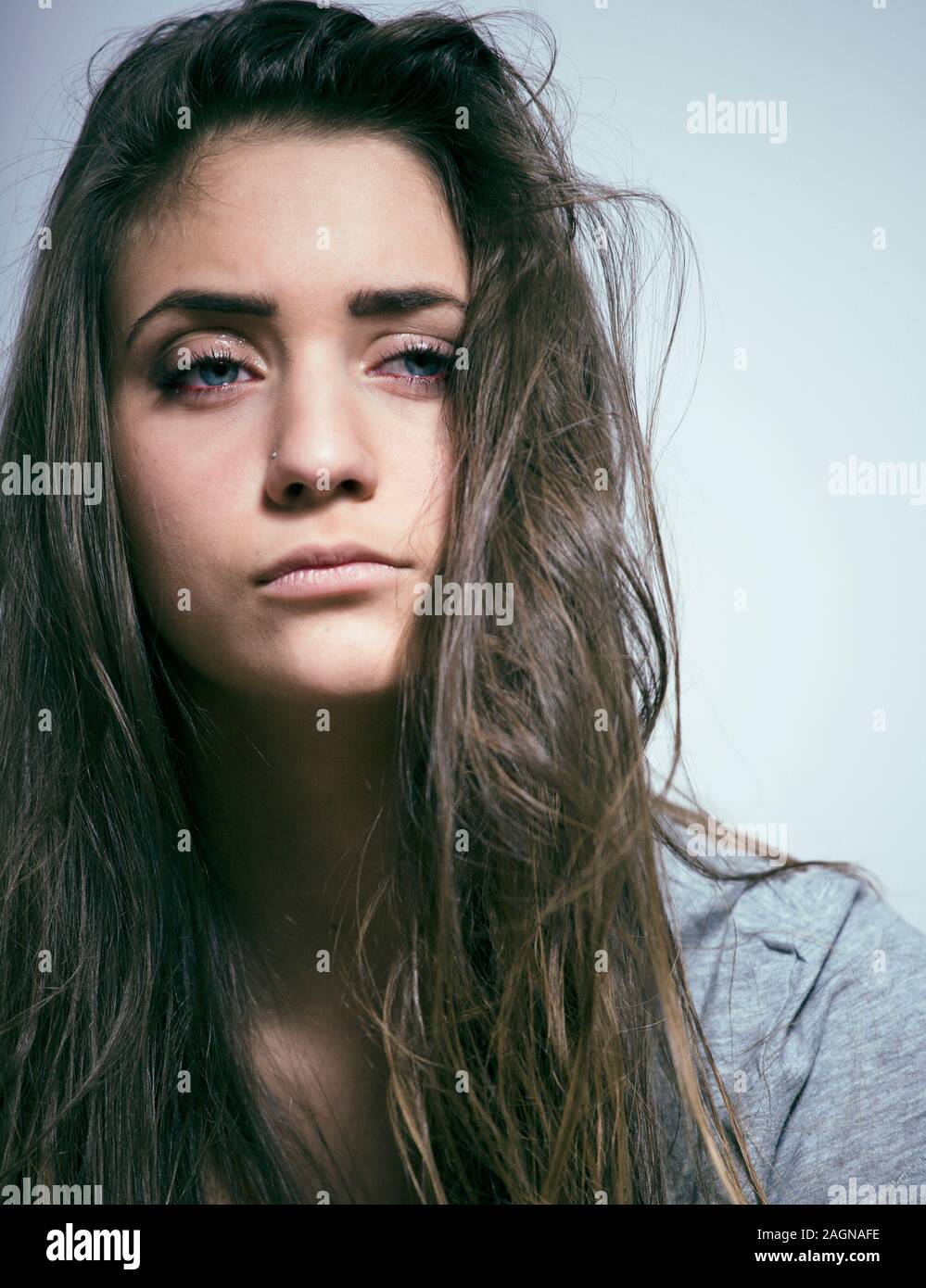 problem depressed teenage with messed hair and sad face Stock Photo - Alamy