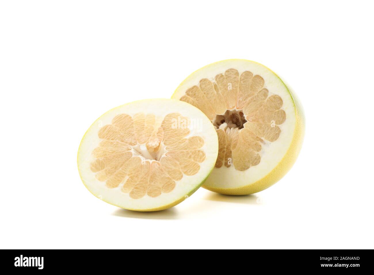Juicy ripe pomelo halves isolated on white background Stock Photo - Alamy