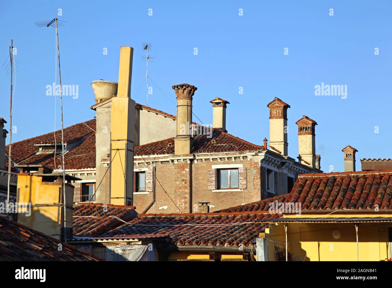 Traditional Style Chimneys at Houses in Venice Italy Stock Photo - Alamy