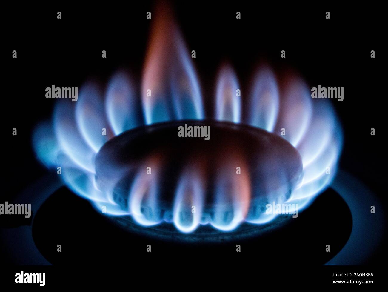 A blue flame emits from a gas cooker Stock Photo - Alamy