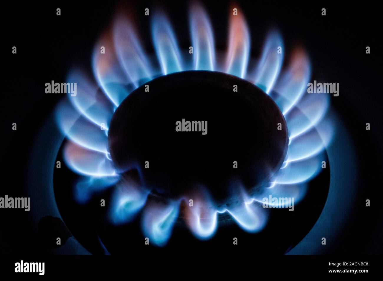 A blue flame emits from a gas cooker Stock Photo - Alamy