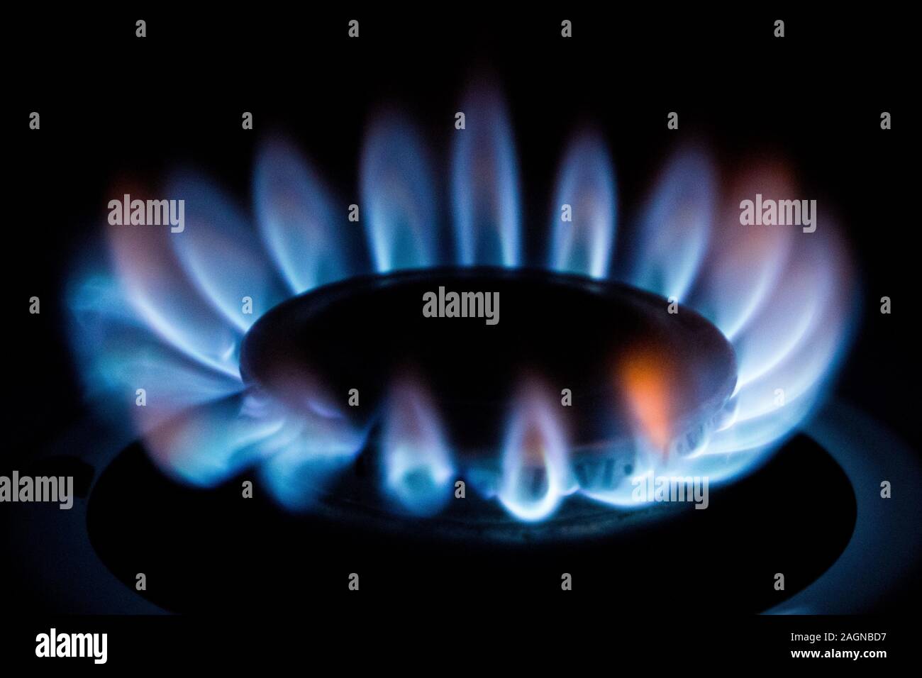 A blue flame emits from a gas cooker Stock Photo - Alamy