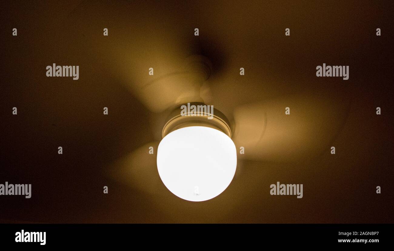 A ceiling fan in motion Stock Photo - Alamy