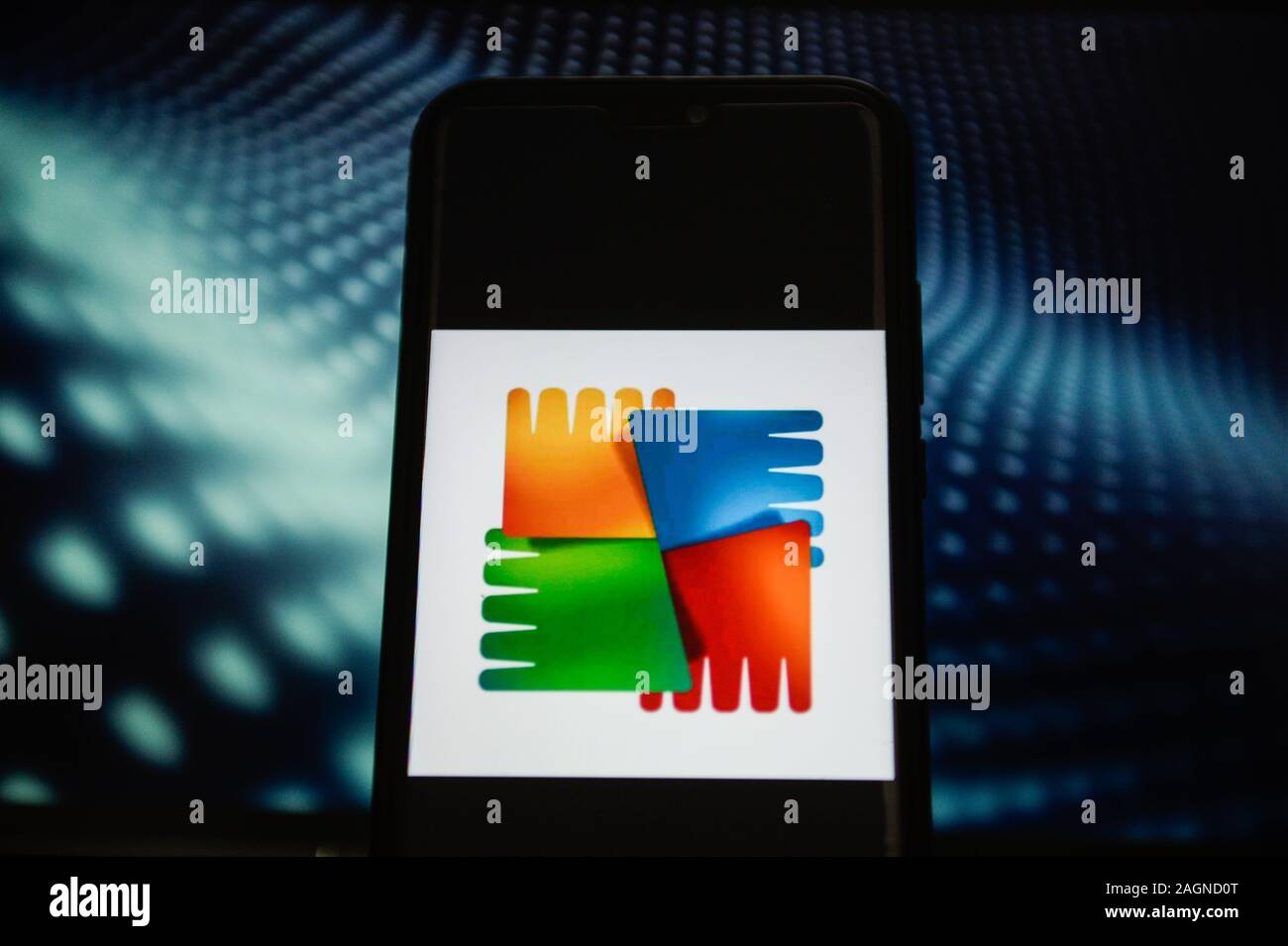 In this photo illustration an AVG antivirus logo seen displayed on a ...