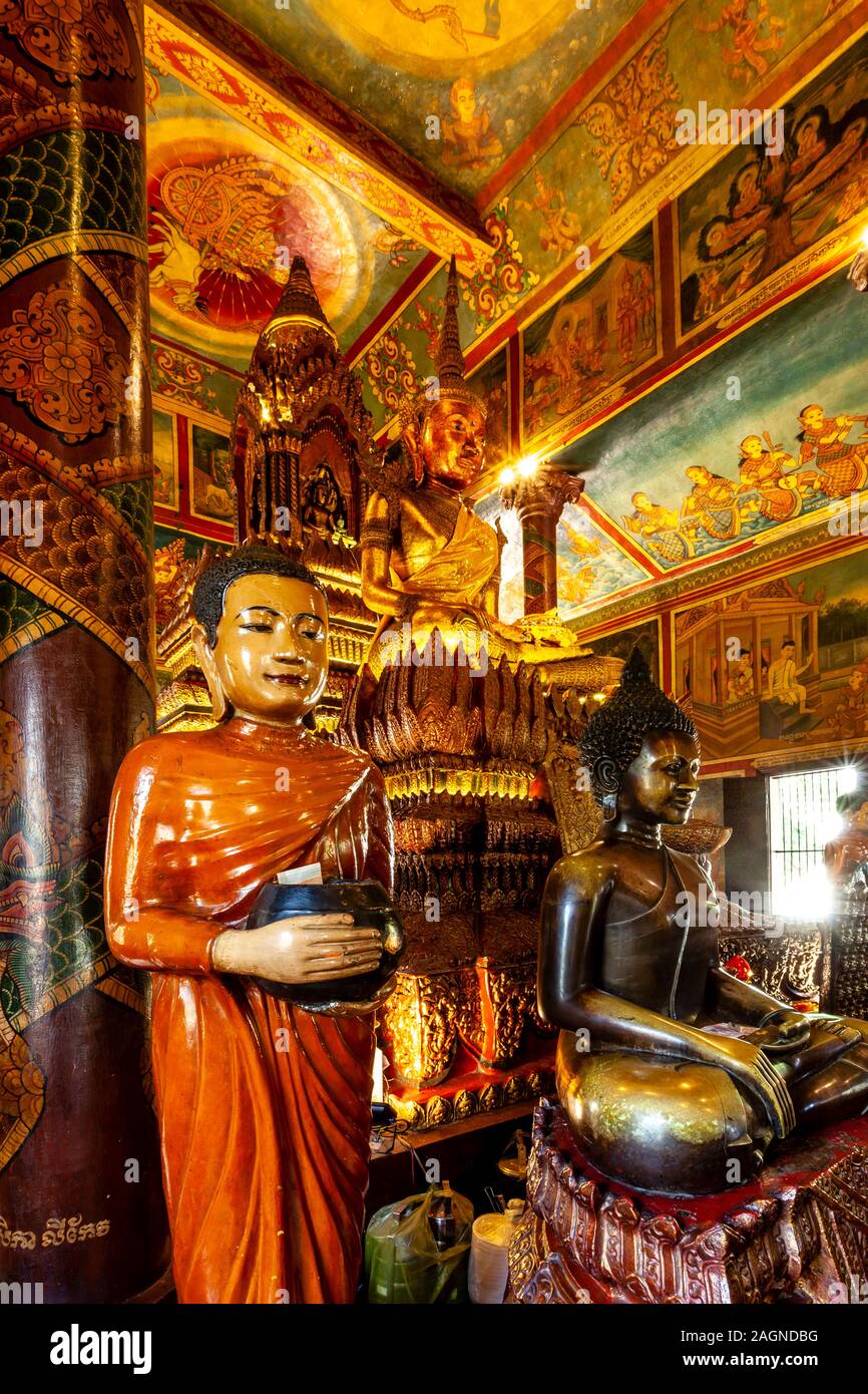 The Colourful Interior Of Wat Phnom Buddhist Temple, Phnom Penh ...