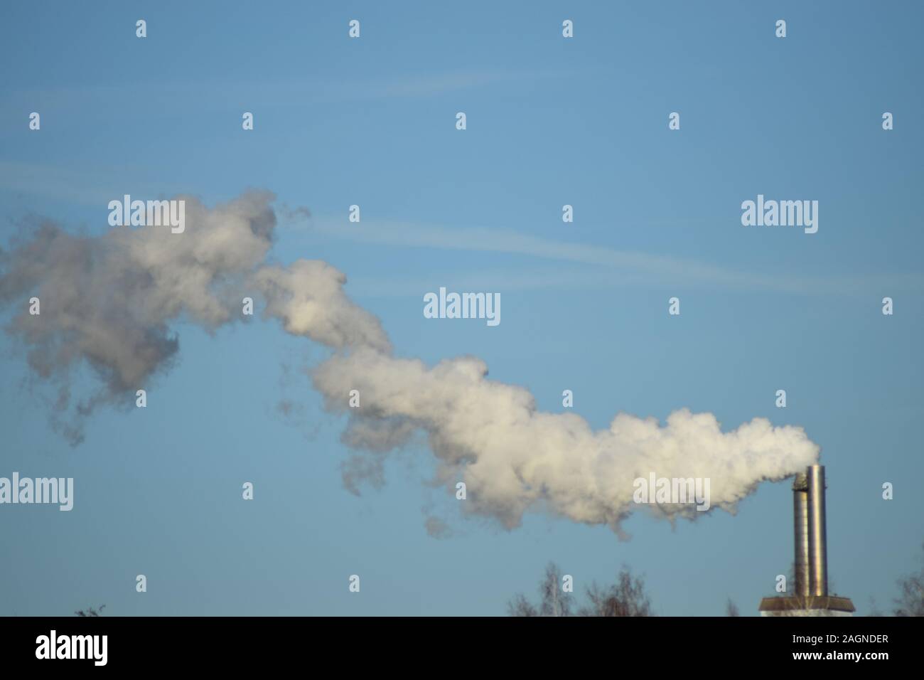 smoke from a steel chimney Stock Photo - Alamy