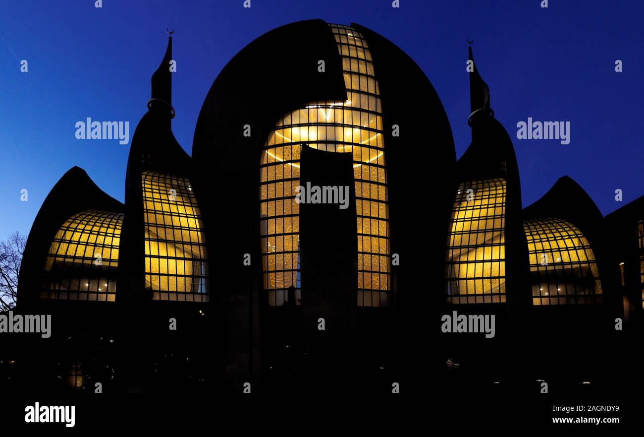 the illuminated cologne central mosque at dusk Stock Photo - Alamy