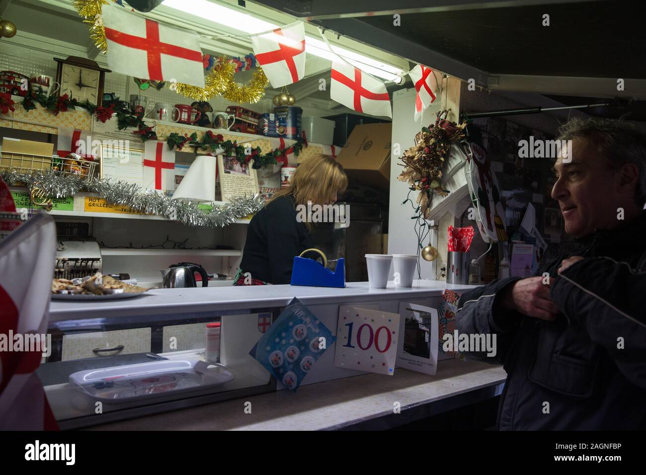 London, UK. 20 December, 2019. Cheryl Diamond serves Dave Conway, the ...