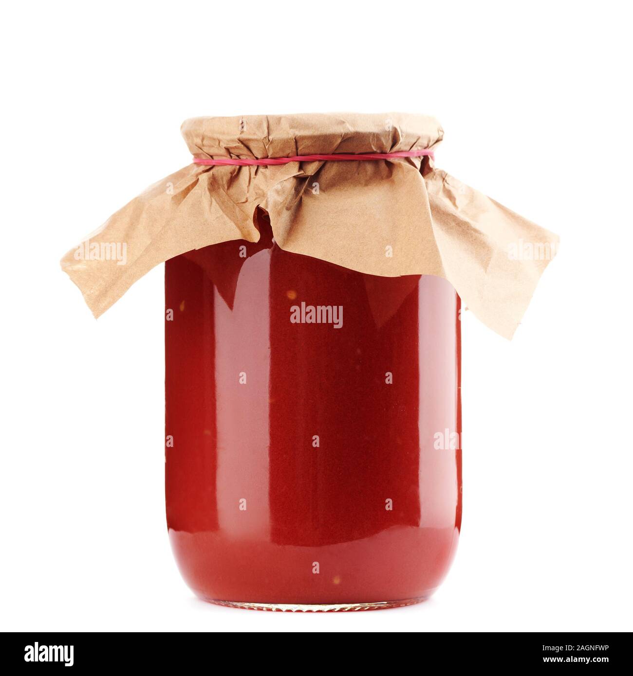 A can of red tomato wrapped paper is shot close-up Stock Photo - Alamy