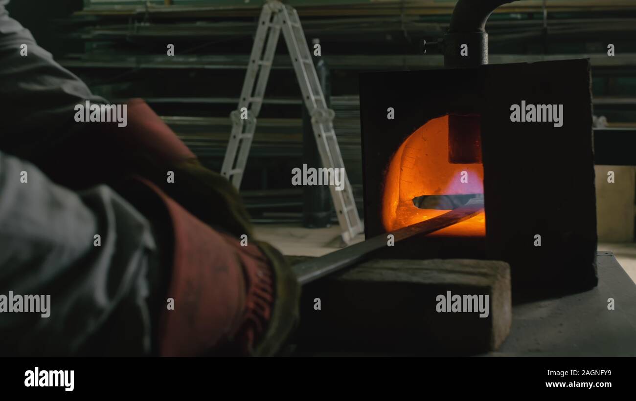 Forge workshop. Smithy manual production. Gas furnace for heating metal ...