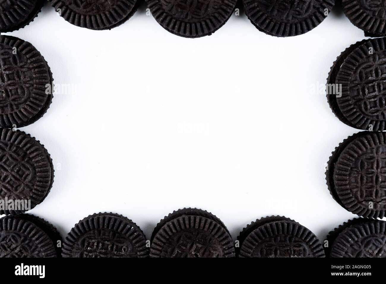 A frame made of sandwich cookies on white background Stock Photo - Alamy