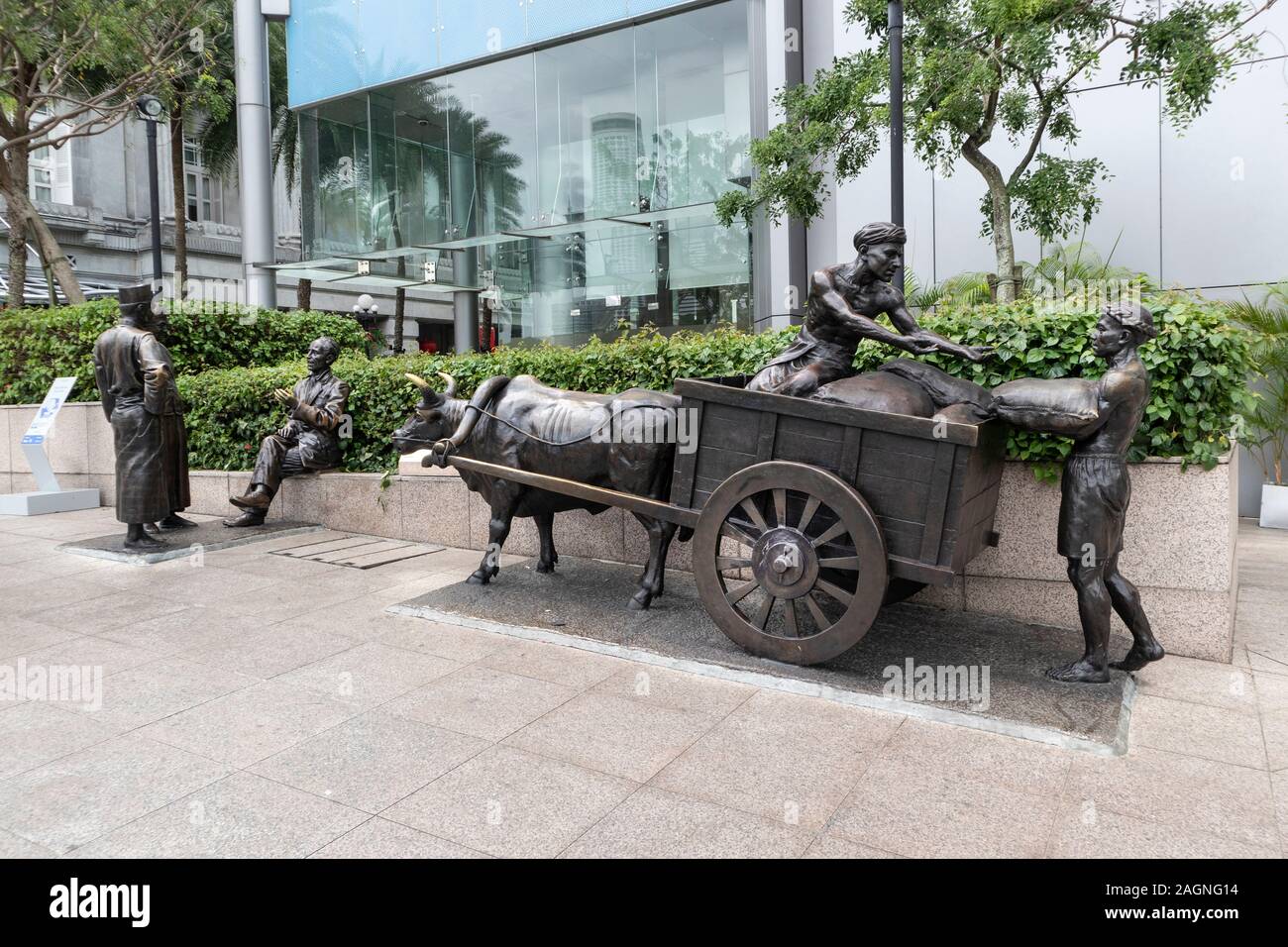 Bronze statues of The River Merchants on the River Sing in Singapore ...