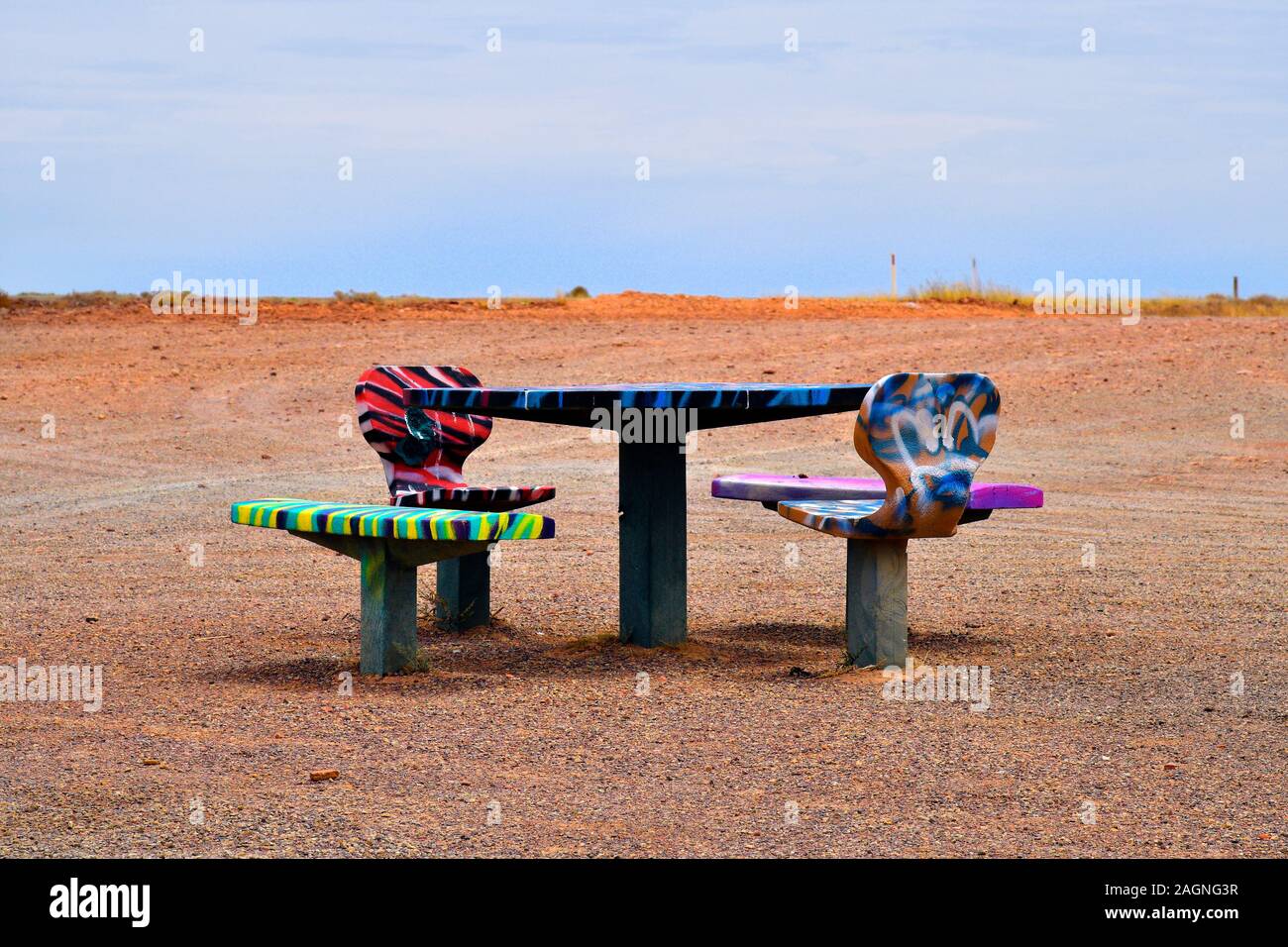 Australia, colorful chairs and table on rest area on Stuart highway ...