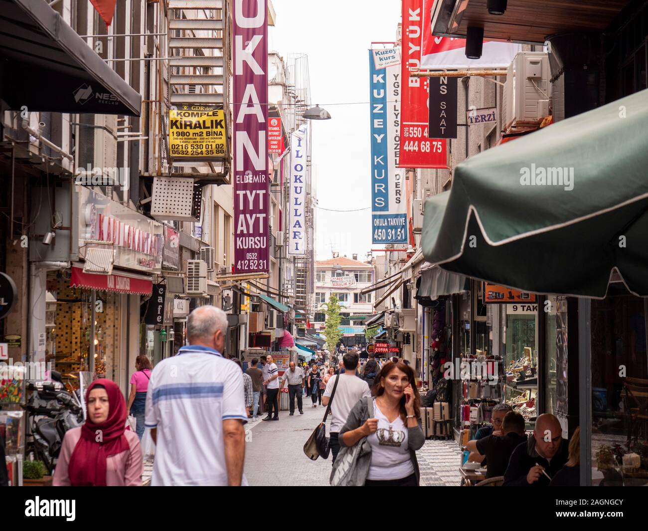 Istanbul , Turkey ; October 2019 : Long-shot of crowded local street ...