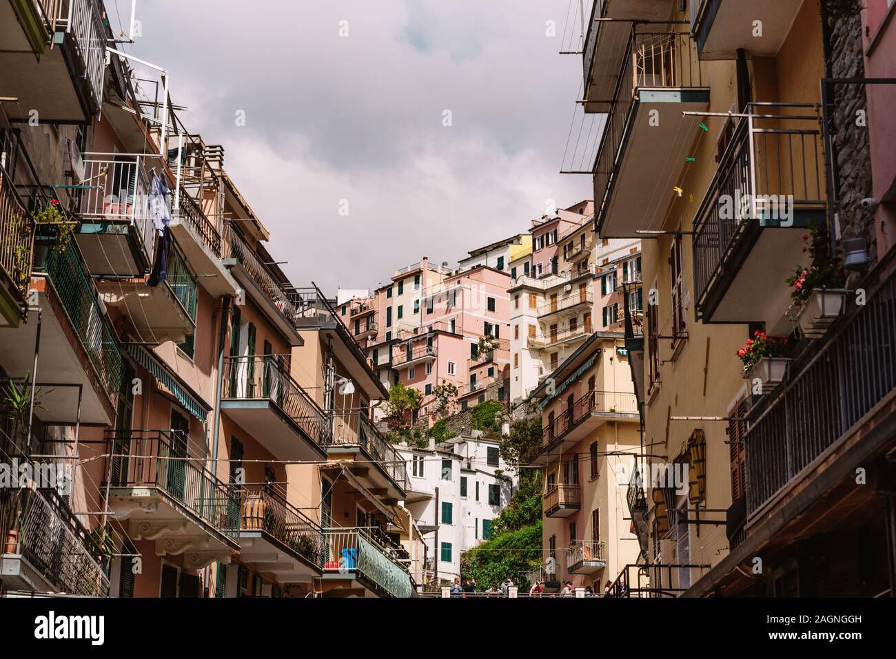 Multi-storey colourful houses in sunny Italy. Beautiful italian ...