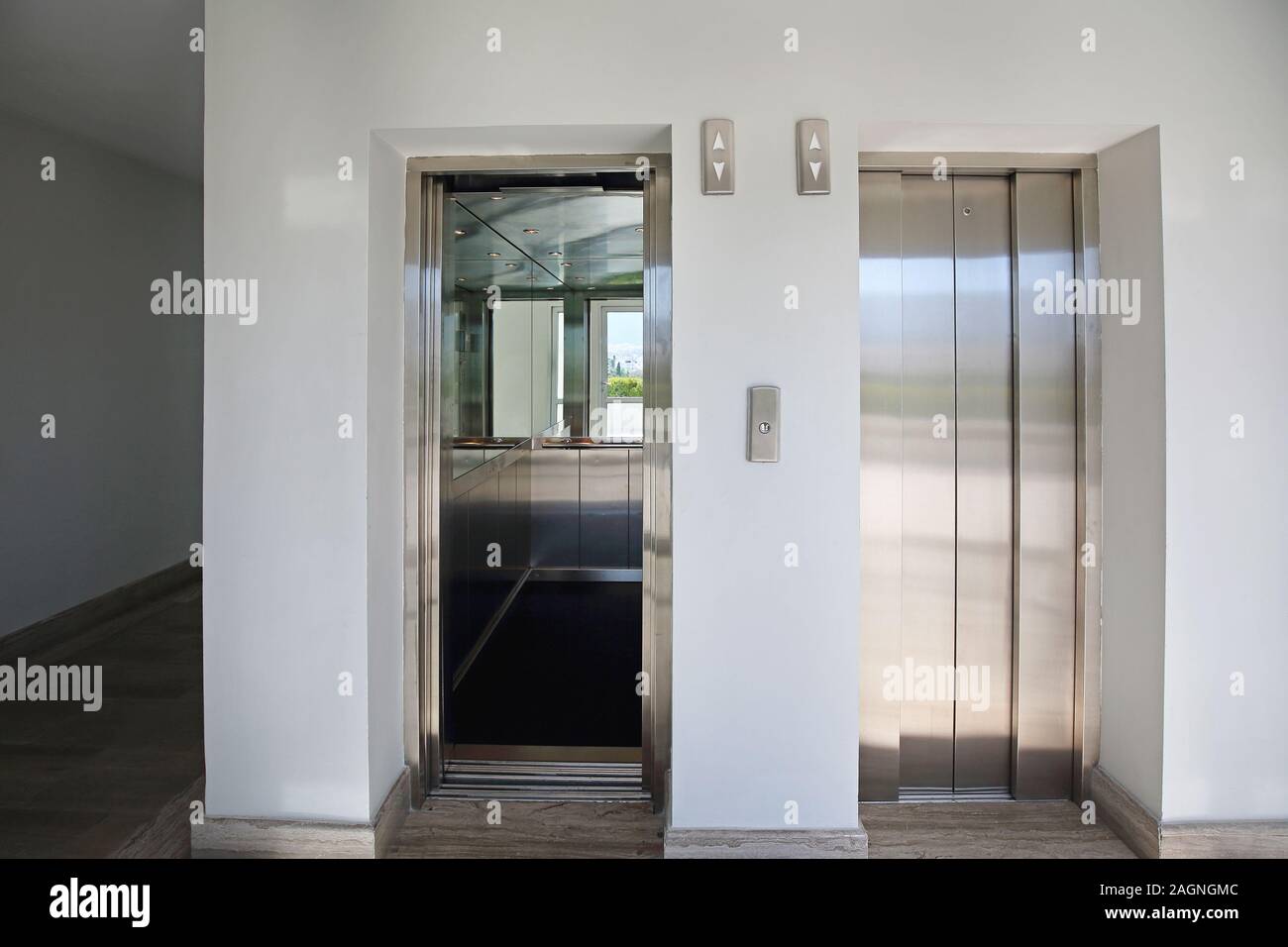 Open and Closed Lift Door at Modern Elevator Stock Photo - Alamy