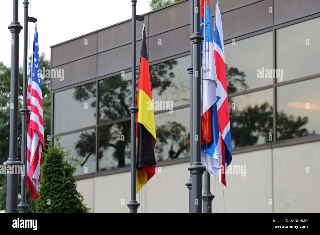 Flag Poles With Several International Flags Stock Photo - Alamy